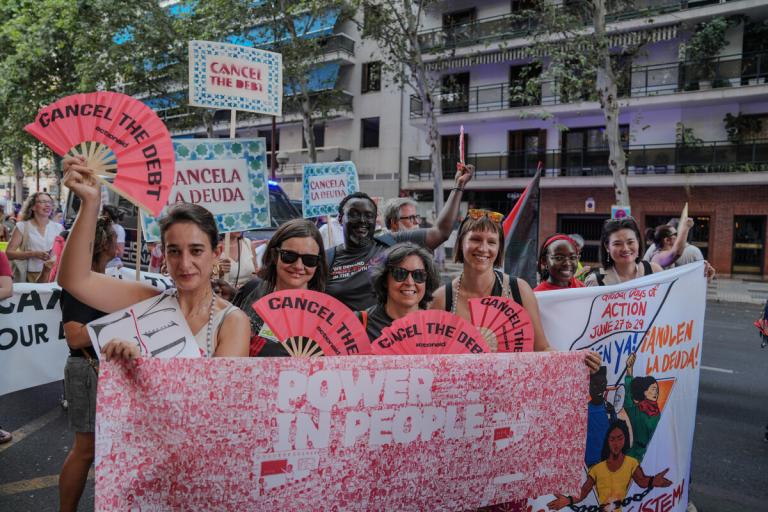 Thousands of activists take to the streets demanding urgent debt ...